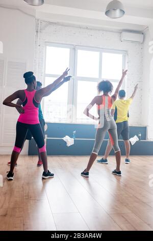 People practicing dance movements in class Stock Photo - Alamy