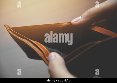 Man hand open an empty wallet with copy space Stock Photo - Alamy