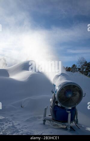 Snow cannon at work on a sunny winter day in Utah Stock Photo - Alamy