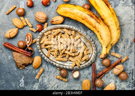 Organic uncooked granola cereal with mixed nuts Stock Photo - Alamy