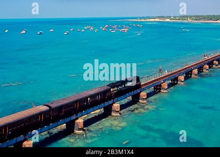 RAMESHWARAM Tamil Nadu, India - A train pass through the Pamban bridge ...