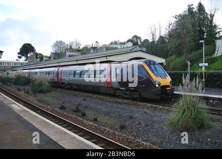 Railway station at Torquay, Devon, with train en route to Paignton ...