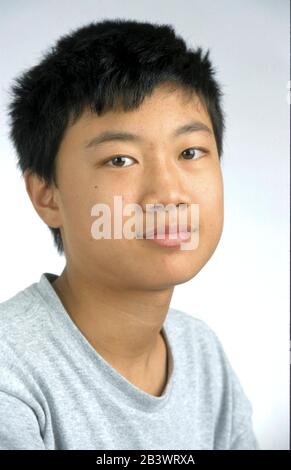 Austin, Texas: Asian-American teenage boy working as waiter in ...