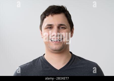 Man with missing front tooth Stock Photo - Alamy