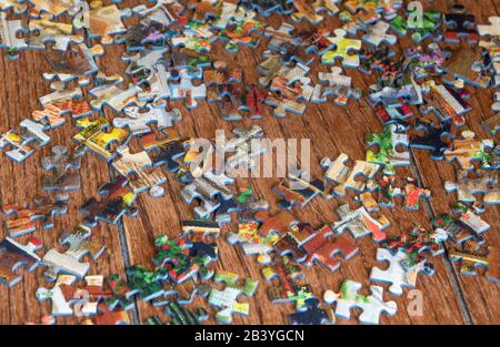 Jigsaw Puzzle and Pieces in Progress Stock Photo - Alamy