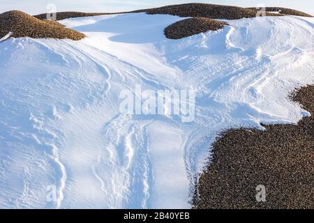 Snow covered rock quarry Stock Photo - Alamy