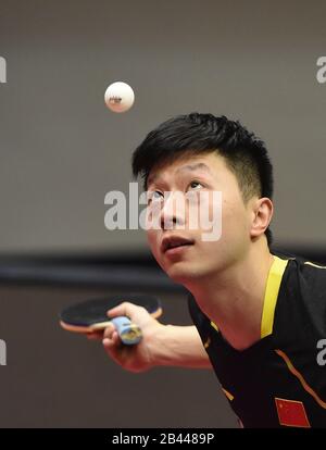 Doha, Qatar. 5th Mar, 2020. Sun Mingyang of China hits a return during ...