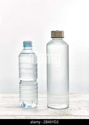 Concept of zero waste with refillablle glass water bottle versus single ...
