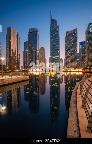 Amazing architecture parallel buildings. Cloudy night sky. Luxury ...