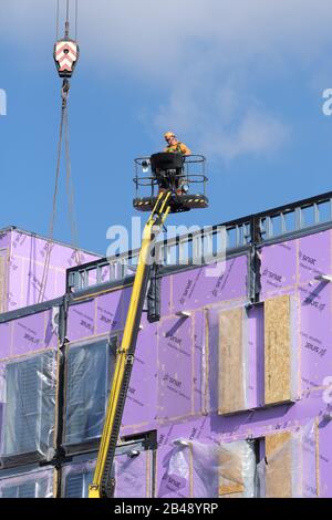 Prefabricated modular construction pods being assembled for student ...