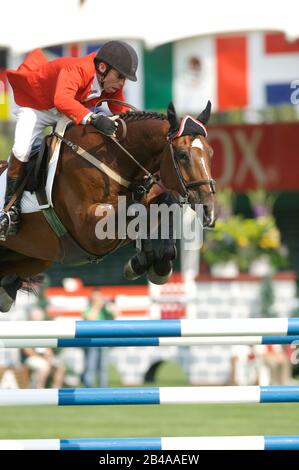 John Pearce (CAN) riding Urioso, CSIO Masters, Spruce Meadows, 8 ...