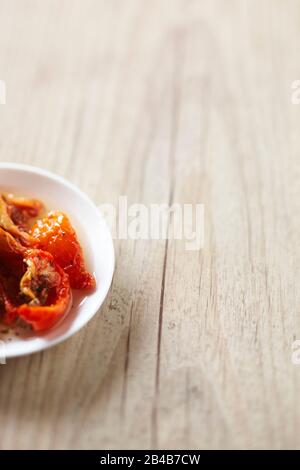 Melted cheese, baked goat cheese, olive tomato Stock Photo - Alamy