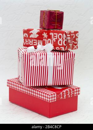gift boxes in wrapping paper under the Christmas tree Stock Photo - Alamy