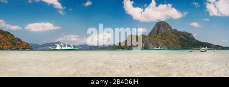 Traditional filipino boats bangka or banca at the blue lagoon in El ...