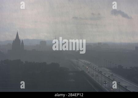 Wien, Vienna: heavy rain over Vienna city center, river Danube, bridge ...