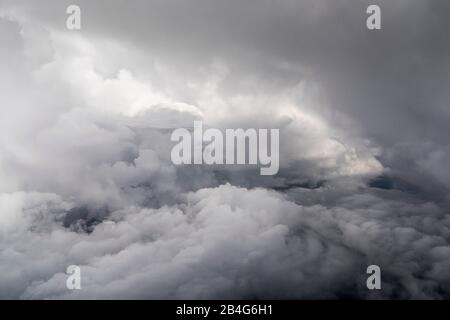 flight, aerial view, Cumulus incus and Cumulonimbus calvus ...