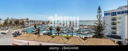 View of the beautiful marina of Faro city at sunset Stock Photo - Alamy