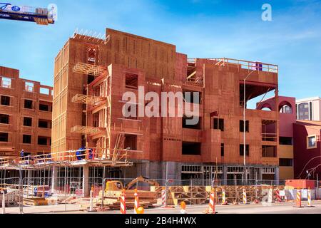 New housing construction with the downtown of Tucson, Arizona in the ...