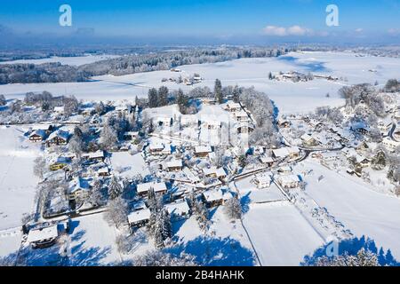 Germany, Bavaria, Icking, Drone view of treelined countryside dirt road ...