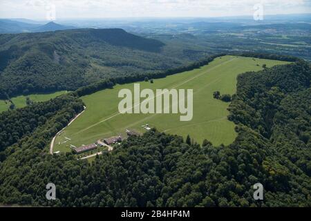 Aerial view of an airfield for sport planes and gliders in the forest ...