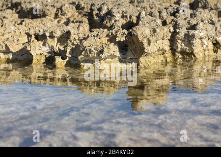 Rocks and limestone eroded on the coast of the sea Stock Photo - Alamy