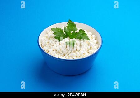 Parsley leaves in a bowl Stock Photo - Alamy