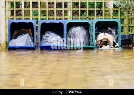 trash rubbish garbage and a knocked over dustbin garbage can in an ...