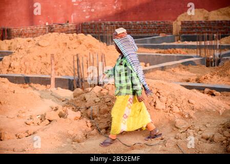 Goalpara, Assam, India. 21 December 2019. Labourers works at a ...