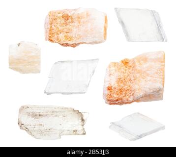 set of various unpolished white and colorless rocks with names cutout ...