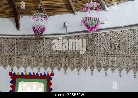 Intricate wall design of mud hut interior of Harijan tribe in Ludia ...