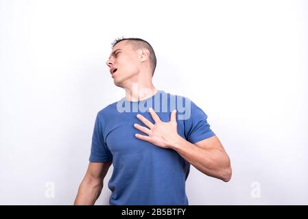 Angry man. white background, medium shot Stock Photo - Alamy