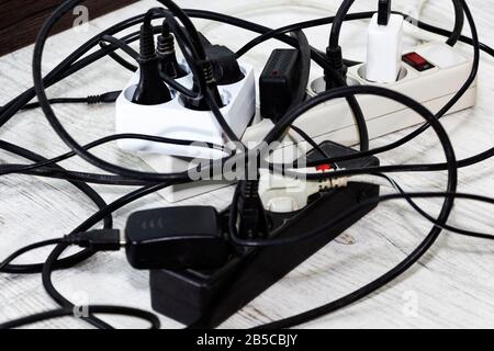 Lots of electrical outlets-enabled devices. Power saving Stock Photo ...