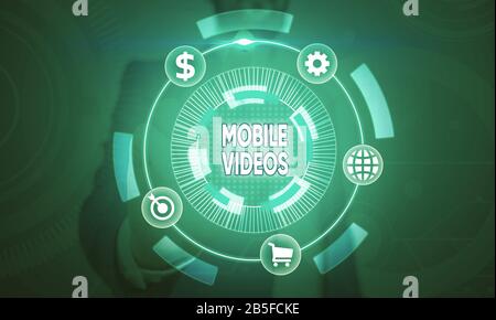 Writing note showing Mobile Videos. Business concept for electronic ...