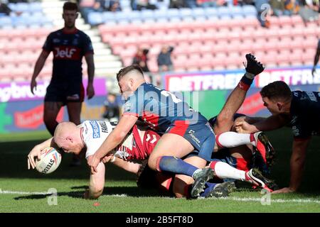 Wigan Warriors Liam Farrell scores their side's third try of the game ...