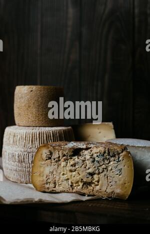 Piece of gorgonzola cheese on baking paper Stock Photo - Alamy