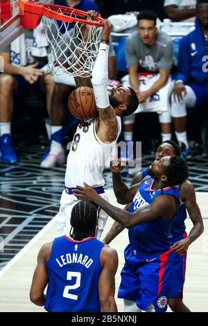 Los Angeles Lakers' Markieff Morris (88) talks with Miami Heat's Tyler ...