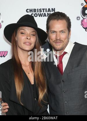 Liz Godwin and Jason Lewis at the Christian Cowan X The Powerpuff Girls ...