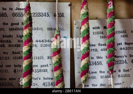 Bell ringers ropes with woollen bulge or sally woven into the rope and ...