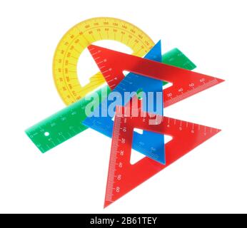 Rulers, triangle and protractor on white background, collage ...