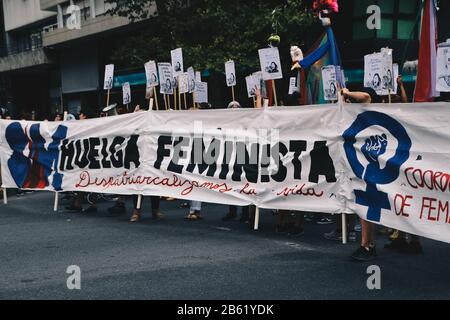 Poster in the 8M protest that says "Not even one less Stock Photo - Alamy