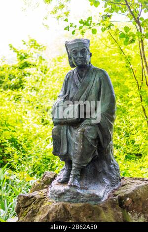Statue of Japanese poet Matsuo Basho in the Basho Heritage Garden, in ...
