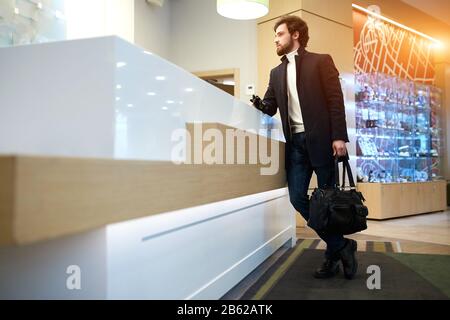 interior of reception space with elegant front desk Stock Photo - Alamy
