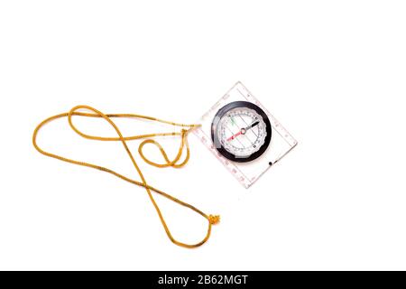 Transparent plastic compass on white background Stock Photo - Alamy