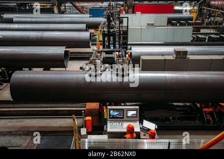 Steel pipe internal seam welding by longitudinal tack welding machine ...
