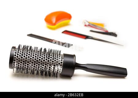 Modern professional combs of different styles over white background ...