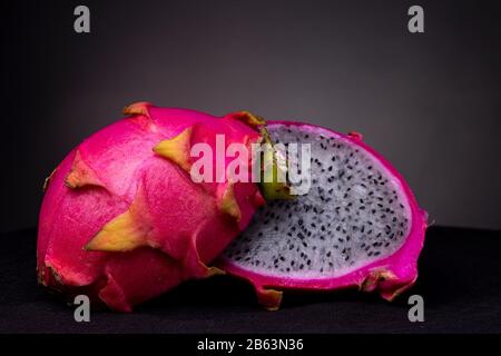 White pulp with black seeds of the white-fleshed Pitaya or Dragon fruit ...