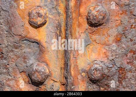 Old rusty sheet pile wall element with hole, North beach, Dune island ...