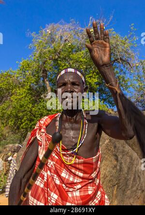 Larim tribe woman dancing during a wedding celebration, Boya Mountains ...