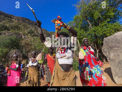 Larim tribe women dancing during a wedding celebration, Boya Mountains ...