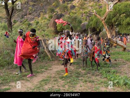 Larim tribe women dancing during a wedding celebration, Boya Mountains ...